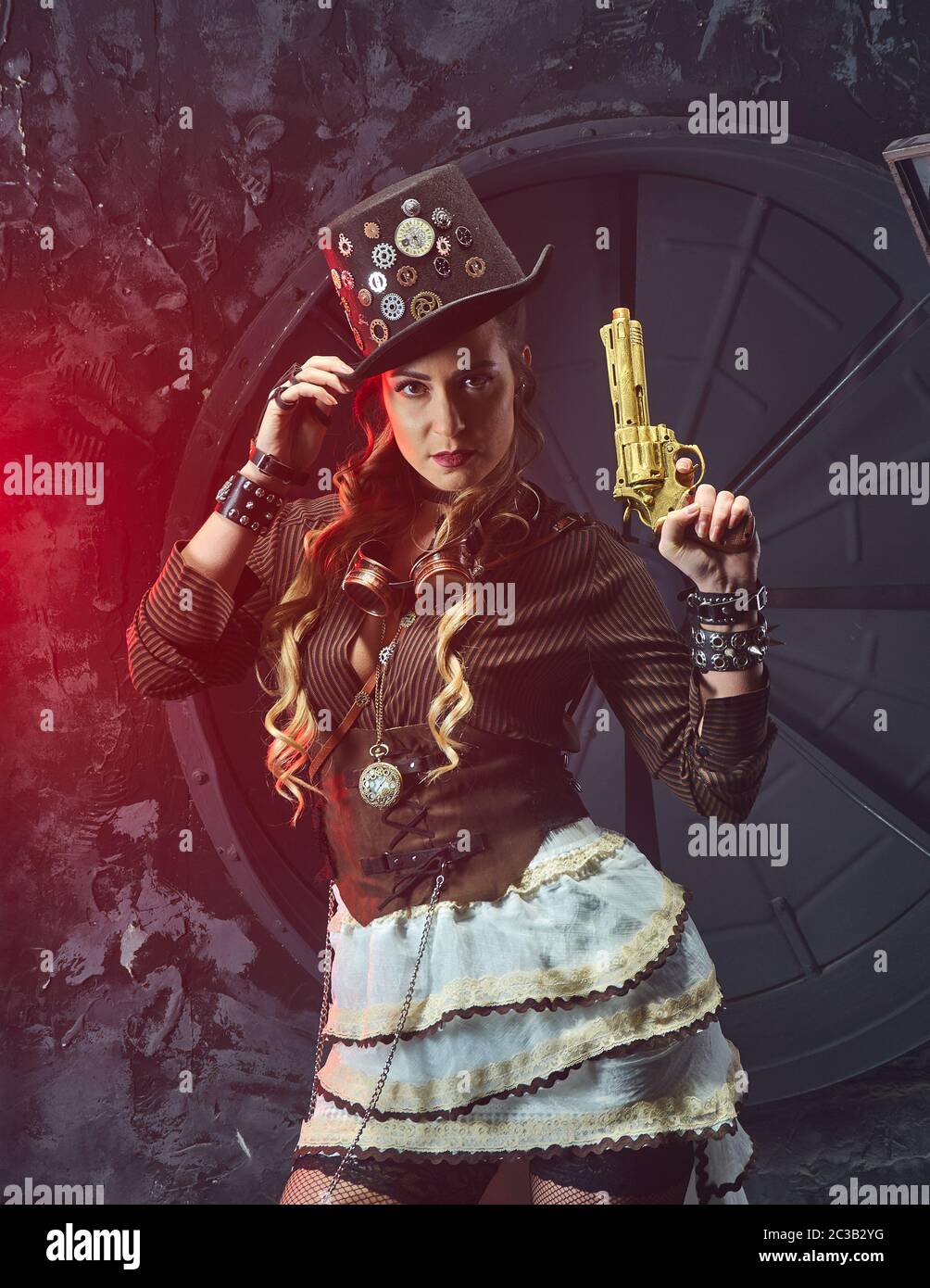 Steampunk woman with mechanical gun Stock Photo - Alamy