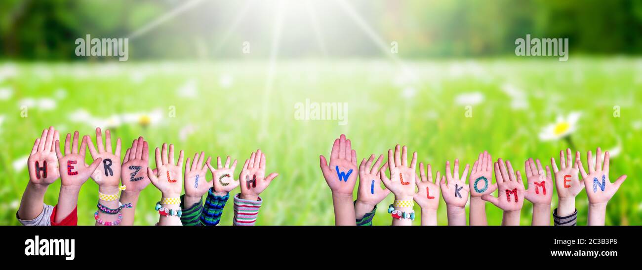 Children Hands Building Colorful German Word Herzlich Willkommen Mean ...