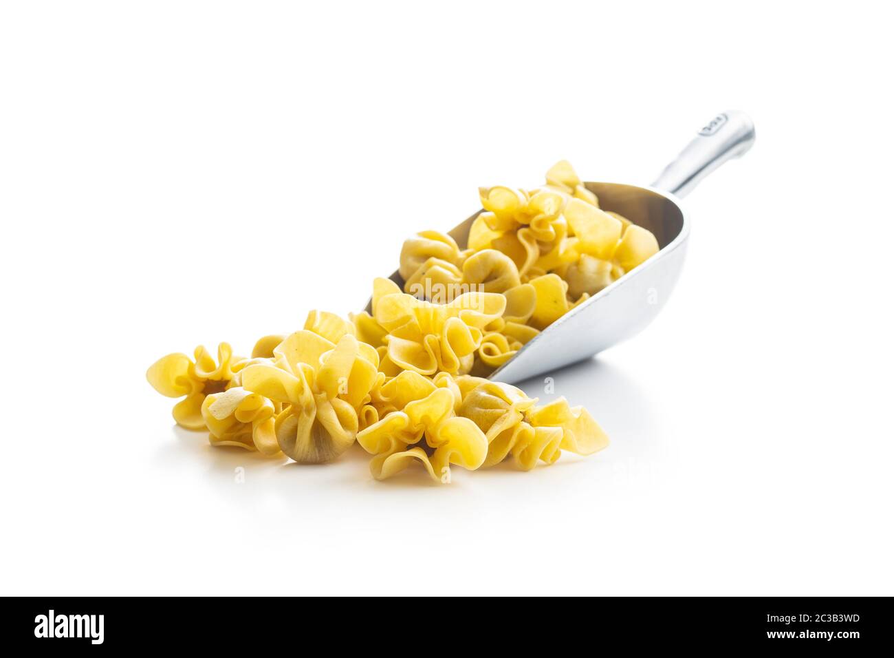 Italian stuffed pasta in scoop. Sacchettini pasta isolated on white ...