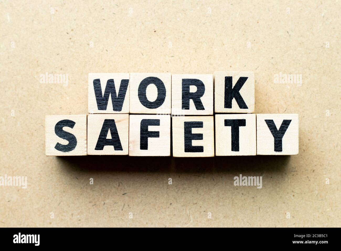 Letter block in word work safety on wood background Stock Photo - Alamy
