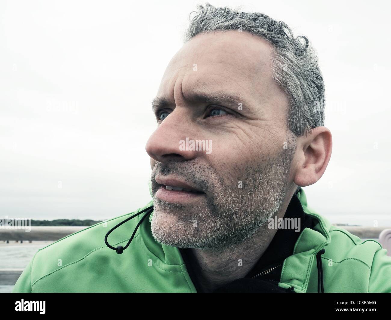 Worried man looking sky hi-res stock photography and images - Alamy