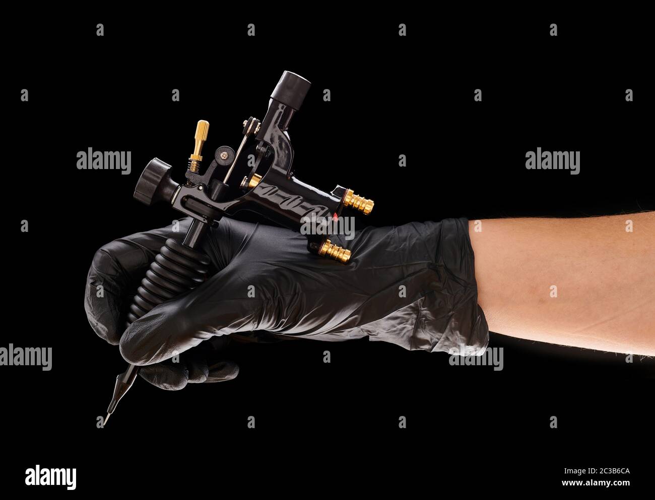 Tattoo artist holding machine hi-res stock photography and images - Alamy