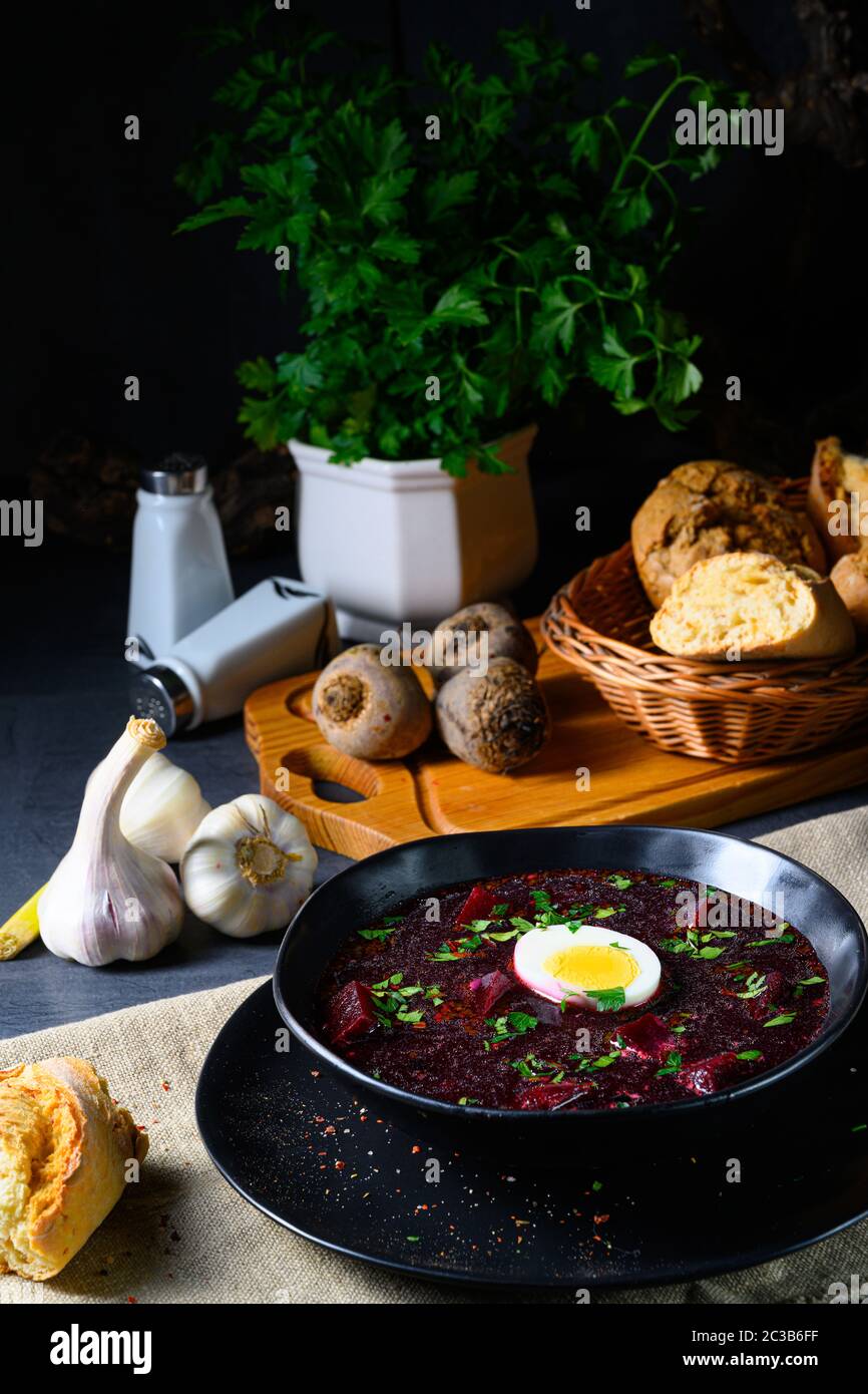 Delicious beetroot borscht with egg Stock Photo - Alamy