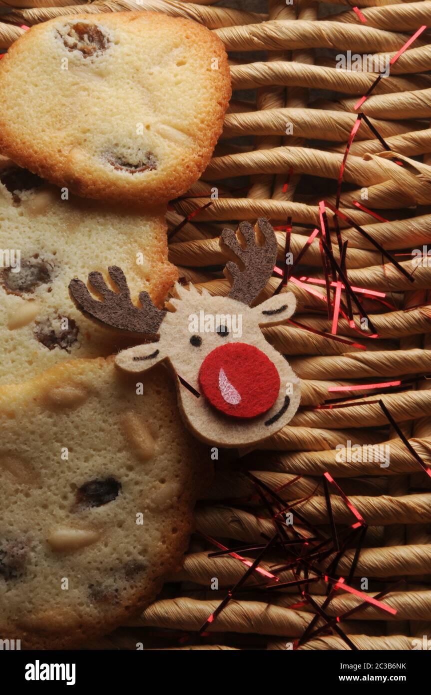 Christmas biscuits with reindeer on straw background Stock Photo - Alamy