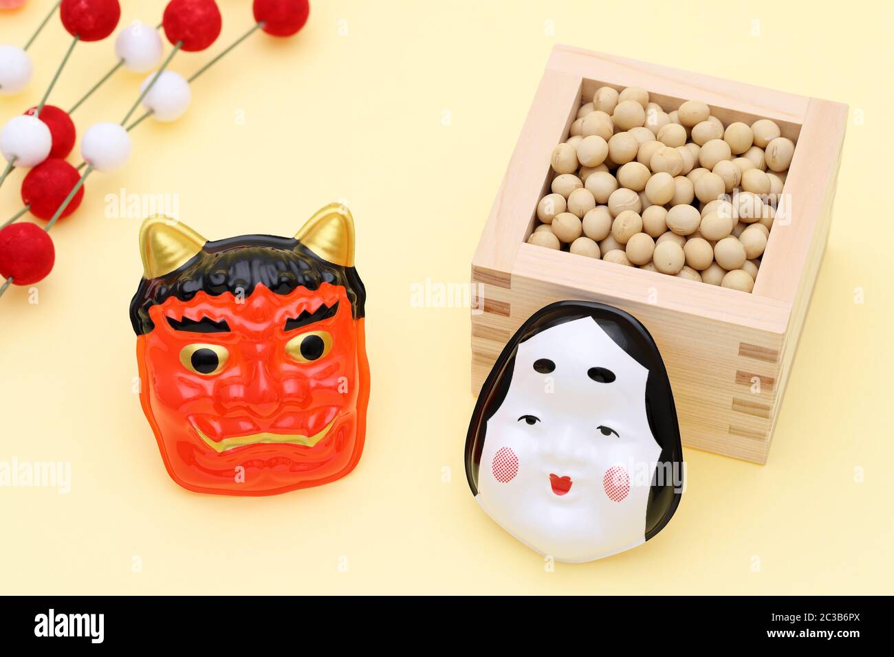 Japanese traditional Setsubun event, Soybeans and masks of oni demon and otafuku are used on an ...