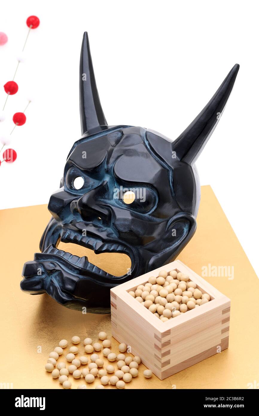 Japanese traditional Setsubun event, Soybeans and masks of oni demon ...