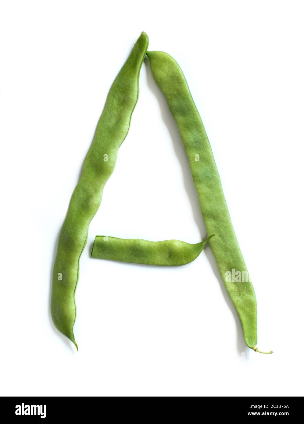 letter A made from Piattoni green beans top view isolated Stock Photo ...