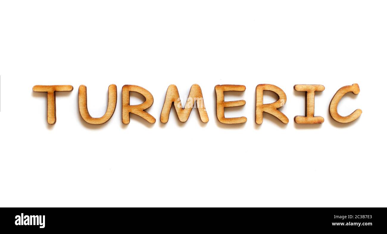 Word Turmeric made from wooden letters isolated on white top view Stock ...