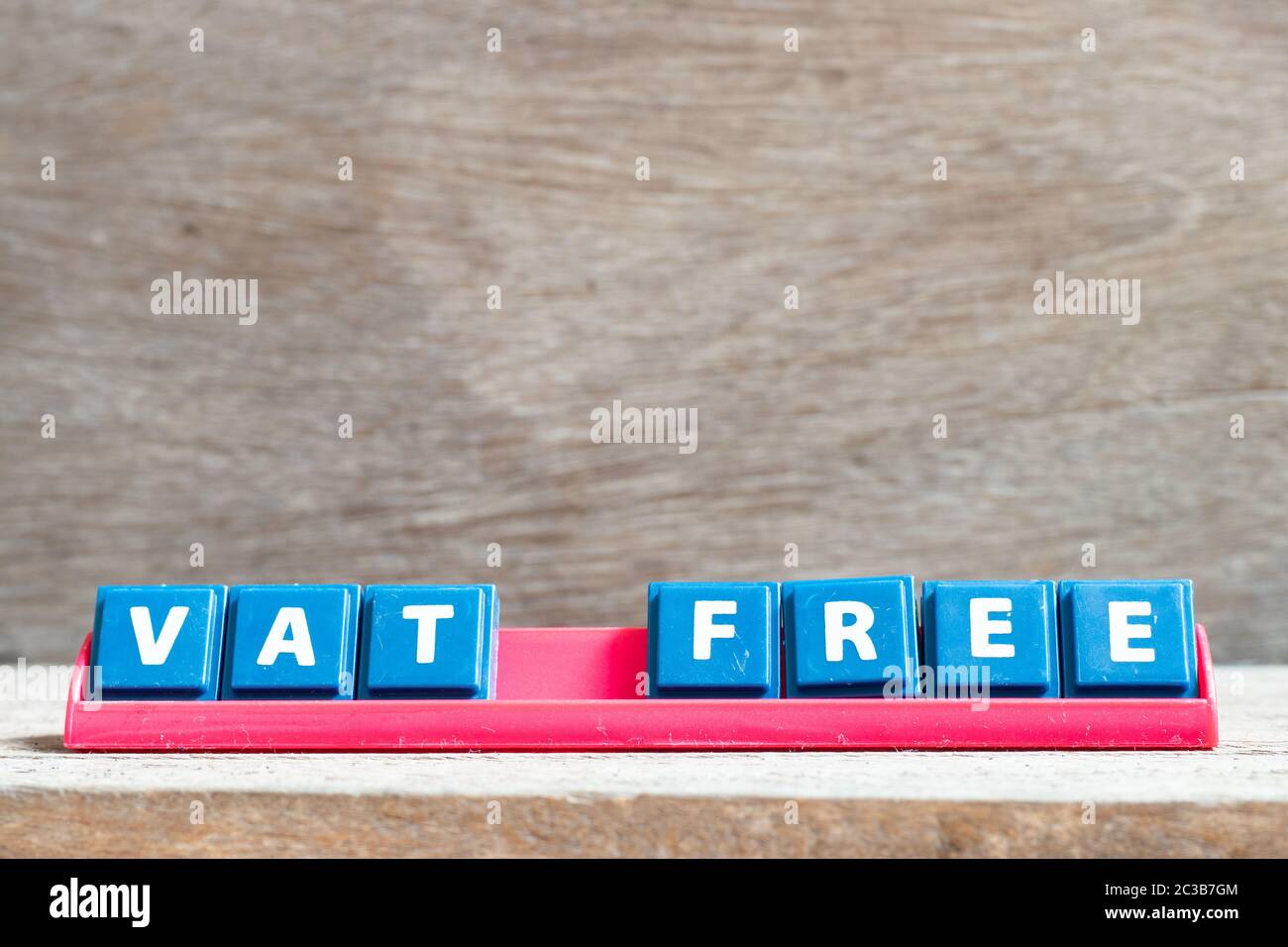 Tile letter on red rack in word vat (value added tax) free on wood ...