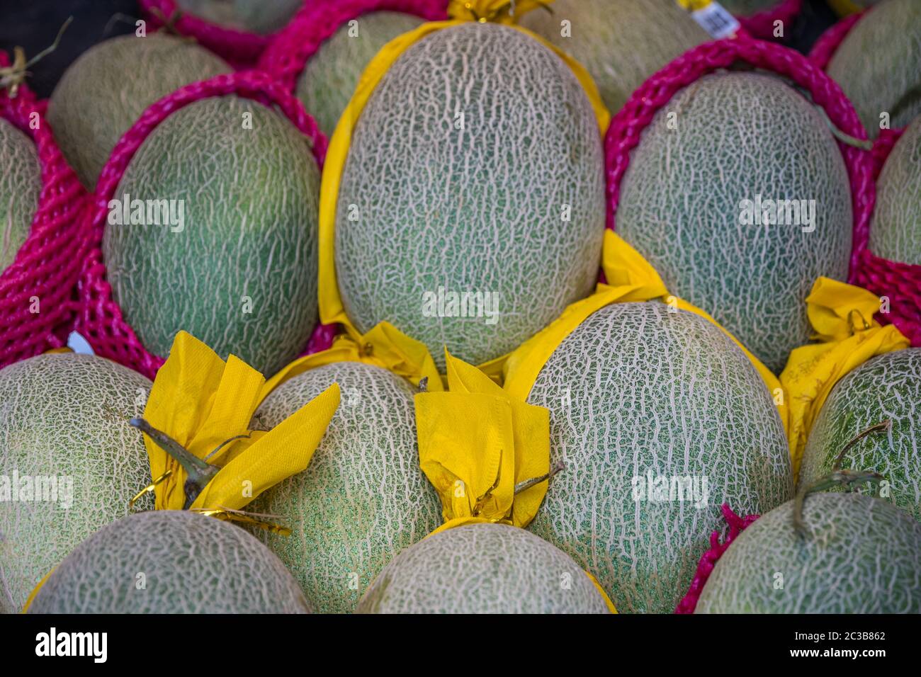 Pile of fresh melons for sale in a fruit and vegetable shop on the ...