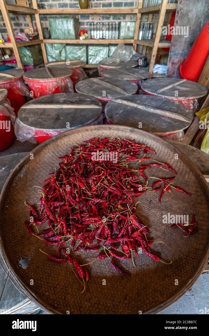 Drying chilli peppers in a village hi-res stock photography and images ...