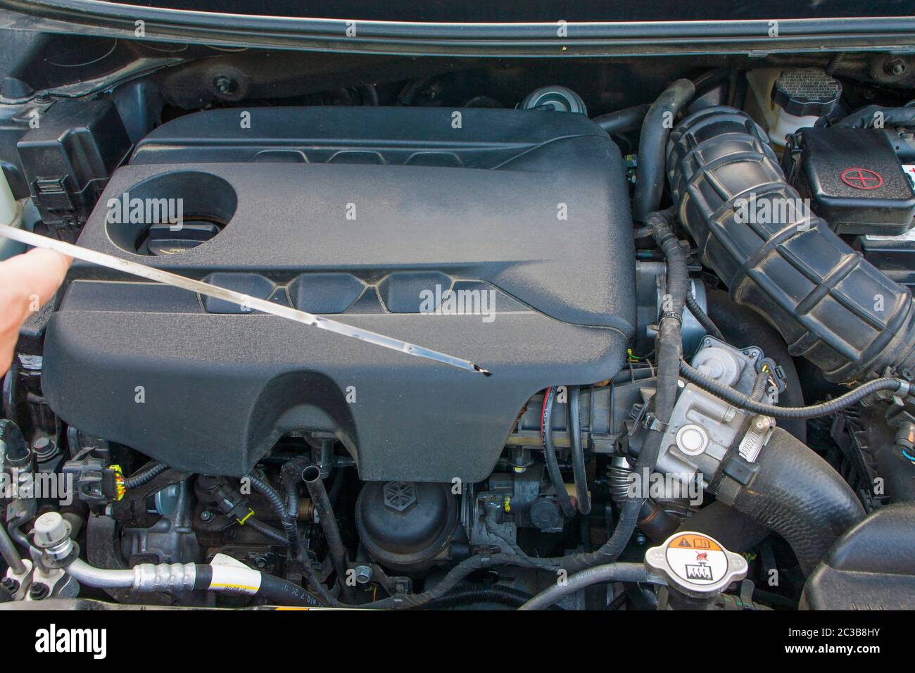 The engine and all the other parts of the car under the hood. Diesel ...