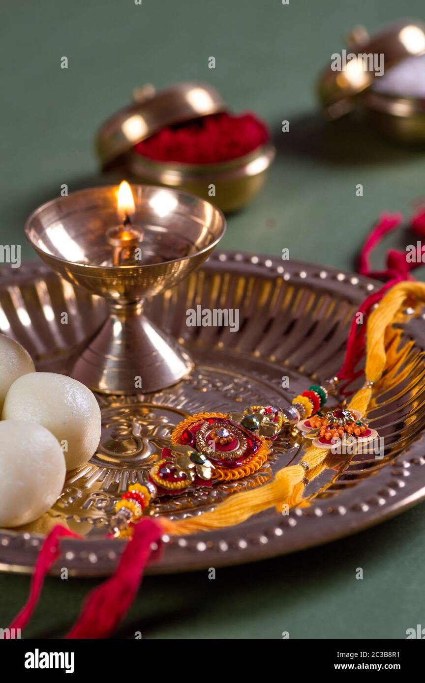 Indian Festival: Raksha Bandhan or Rakhi background with an elegant ...