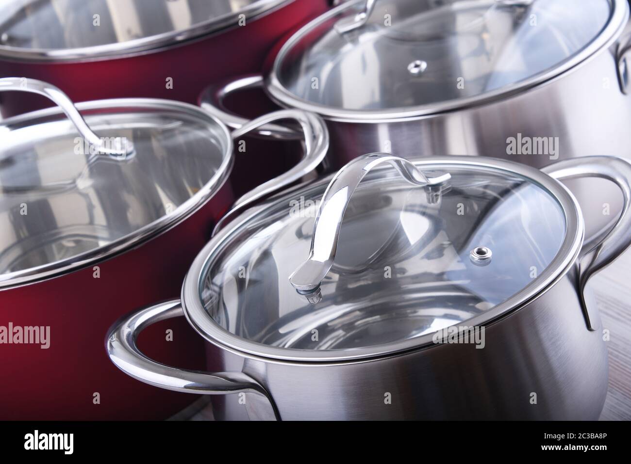 Composition with steel pots Stock Photo - Alamy