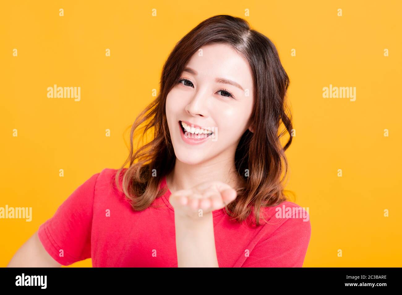 happy Young pretty woman hand showing something Stock Photo - Alamy