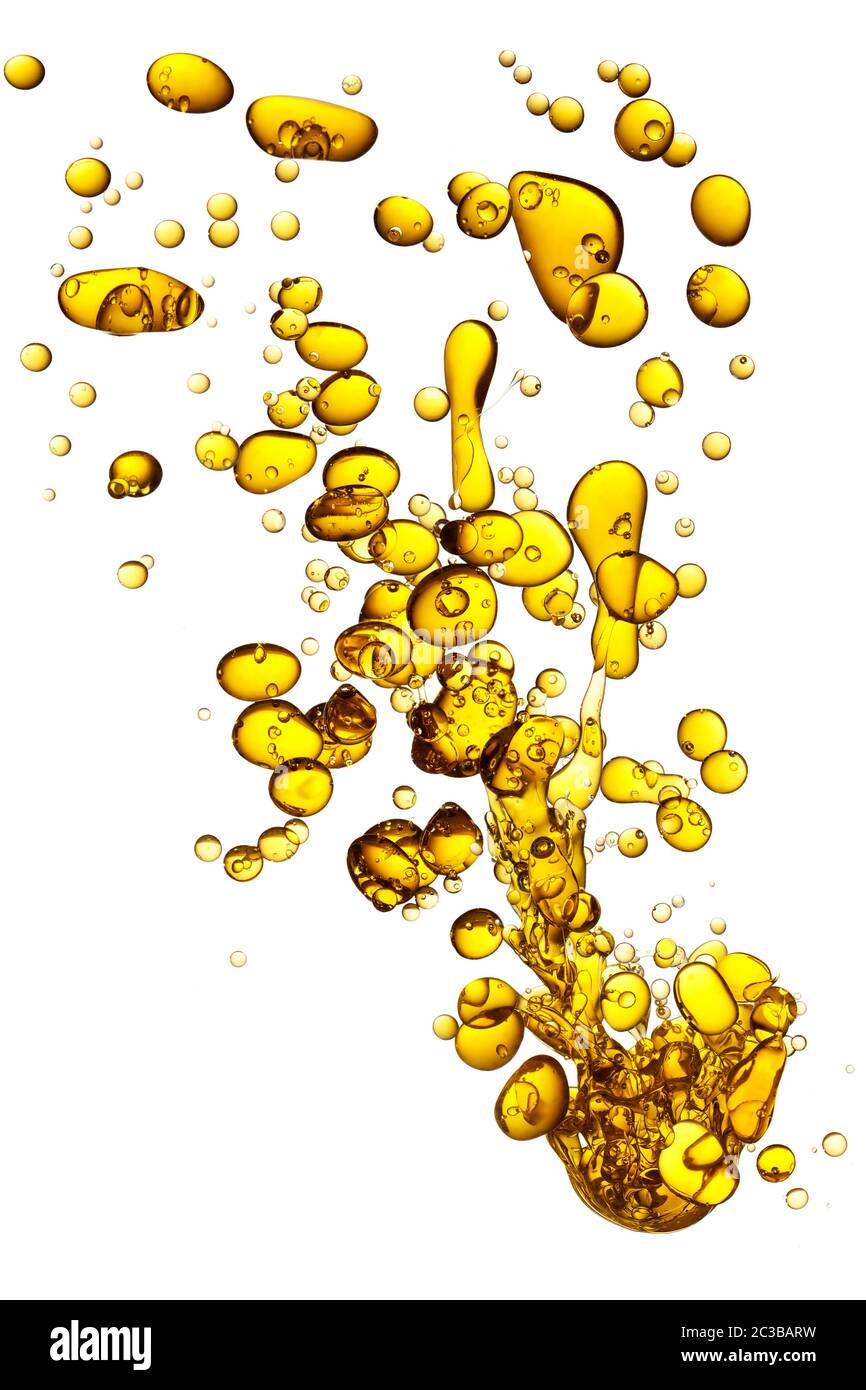 Oil splash and bubbles in the whater. Isolated on White Background ...