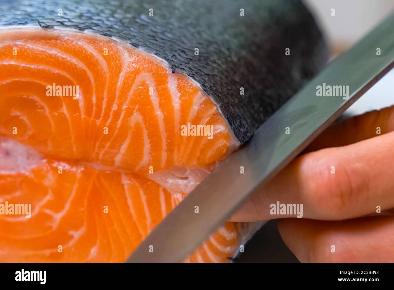 a Butchering salmon, piece of salmon red fish meat Stock Photo - Alamy