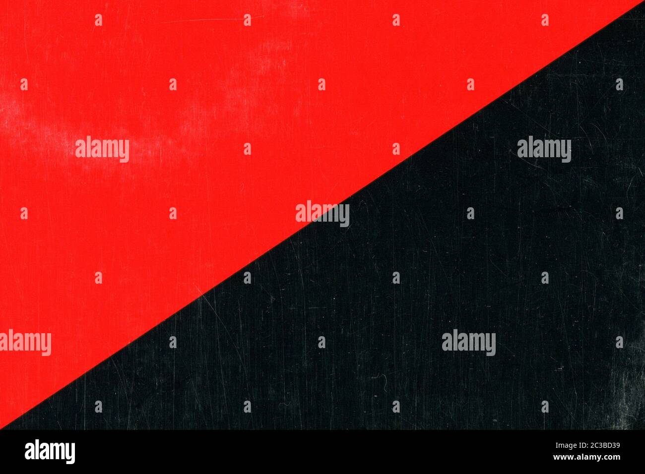 diagonally bisected red and black flag of anarchy Stock Photo - Alamy