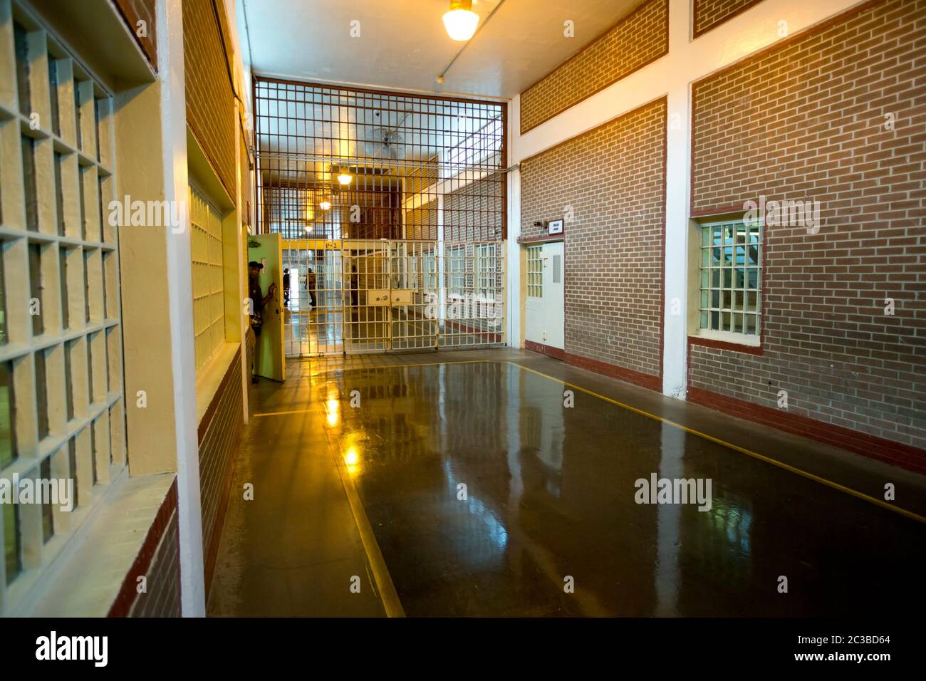 Rosharon Texas USA, August 25 2014: Long hallway with locked gates ...