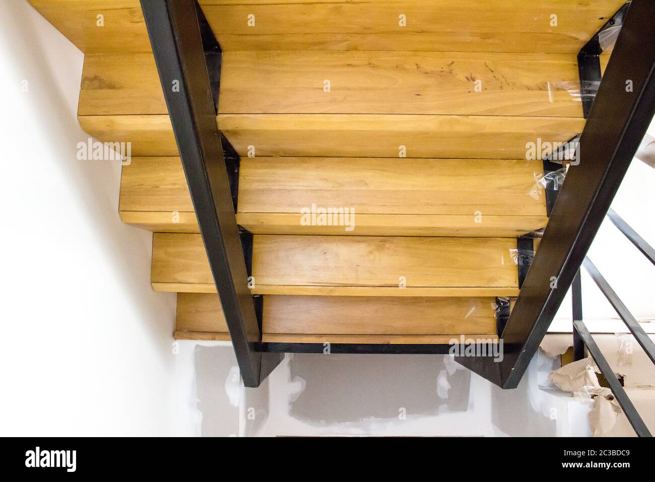 On the other side of the aisle stairs inside the building Stock Photo ...