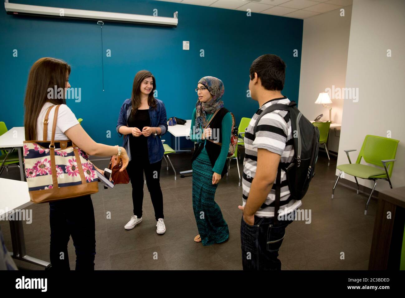 Austin, Texas USA, August 27, 2014: Multi-ethnic group of students chat ...