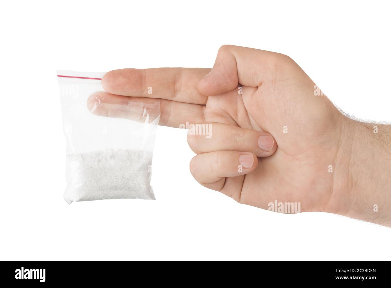 Hand and packet with narcotic Stock Photo - Alamy