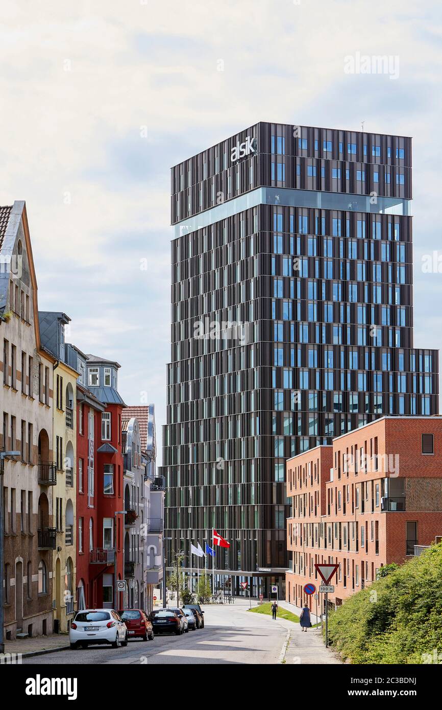 View through the old town with building tower beyond. Hotel Alsik ...