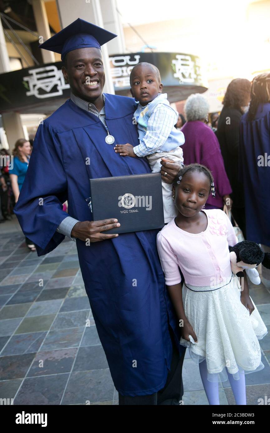 Houston , Texas USA, November 8, 2014: A new graduate wearing ...