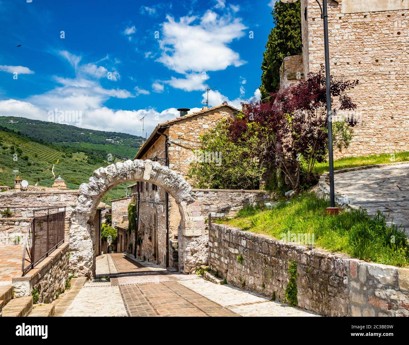 The paved alleys of the village and the stone and brick houses. A Roman ...