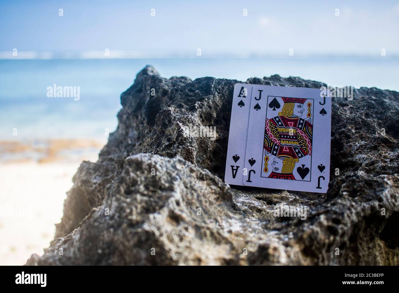 black jack poker card gamble beach theme photo Stock Photo - Alamy