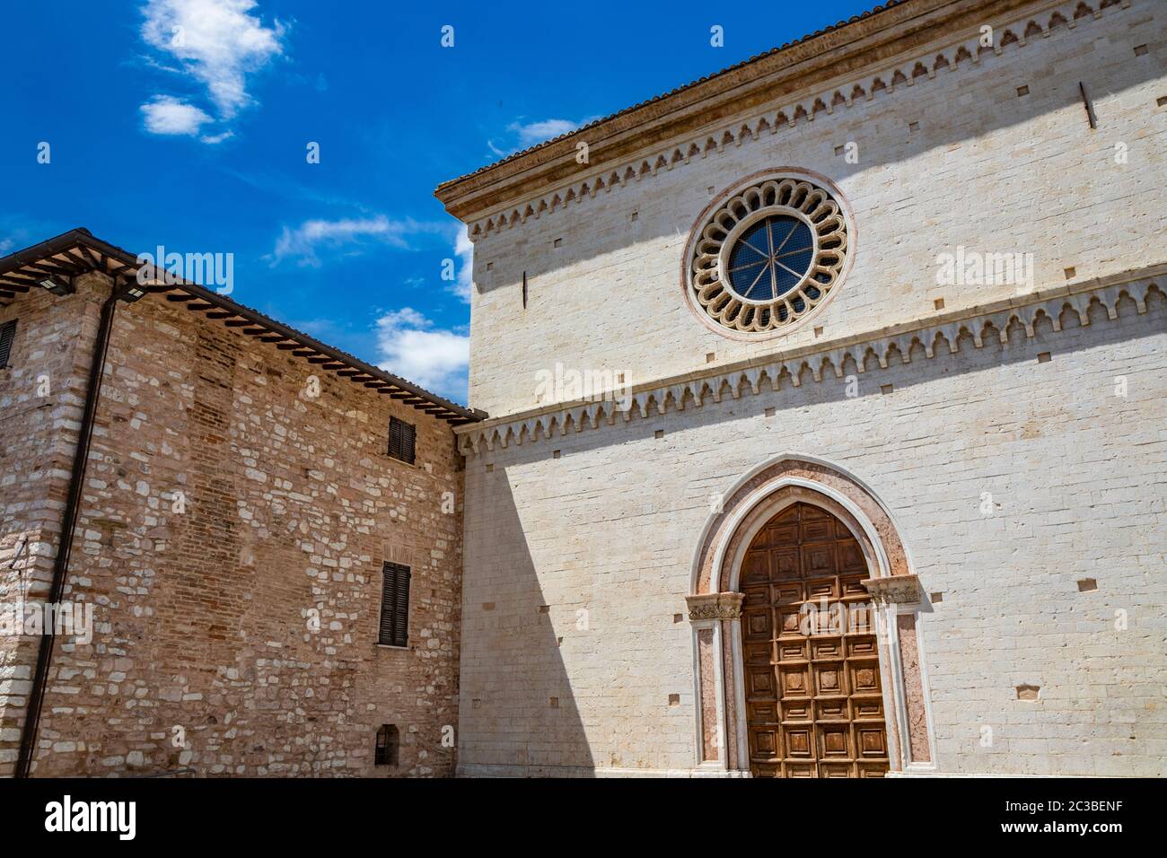 The monastery of the Poor Clares. The wooden portal with a pointed arch ...