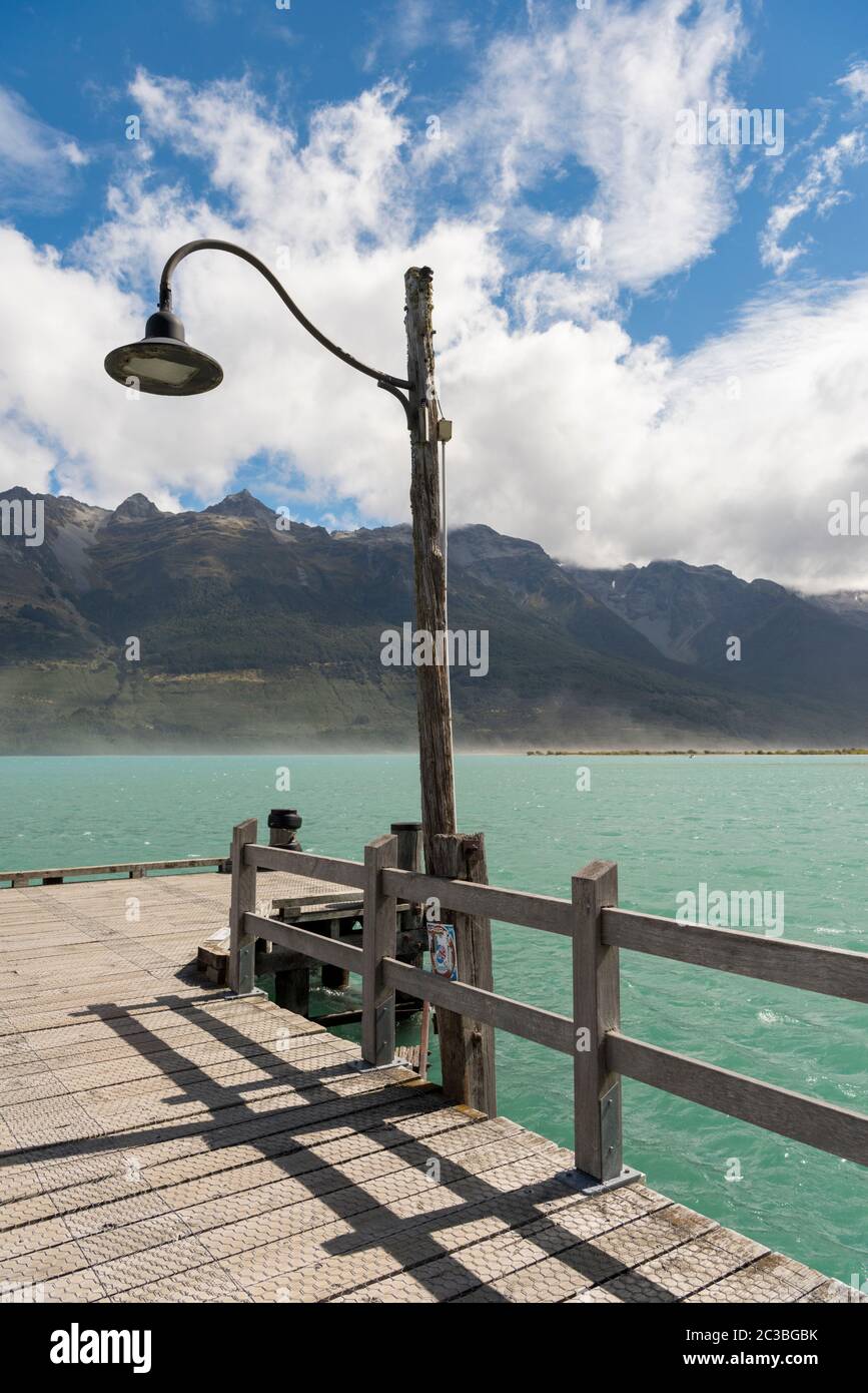 A lamp on a jetty on Lake Wakatipu at Glenorchy New Zealand Stock Photo ...