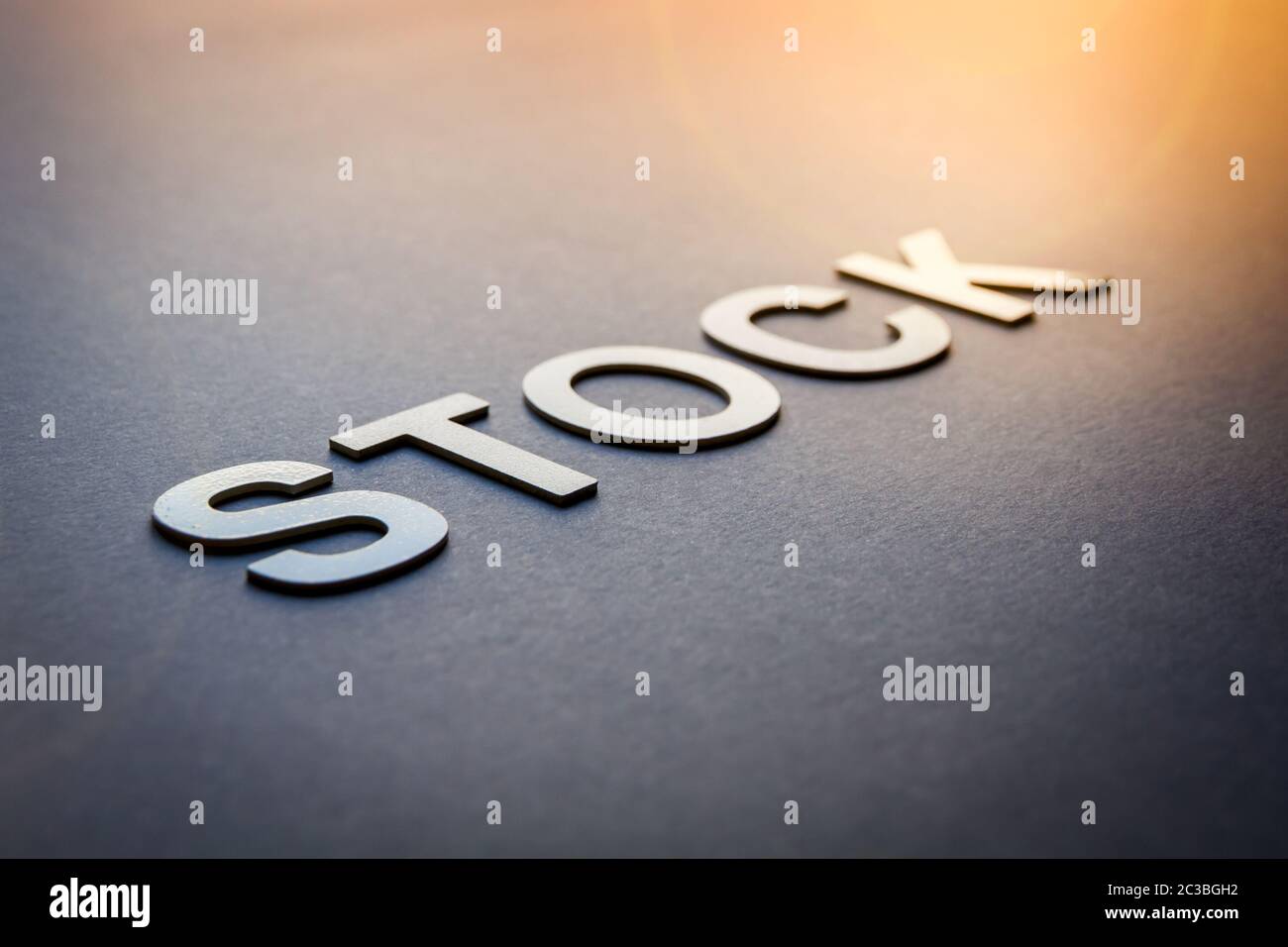 Word stock written with white solid letters on a board Stock Photo - Alamy