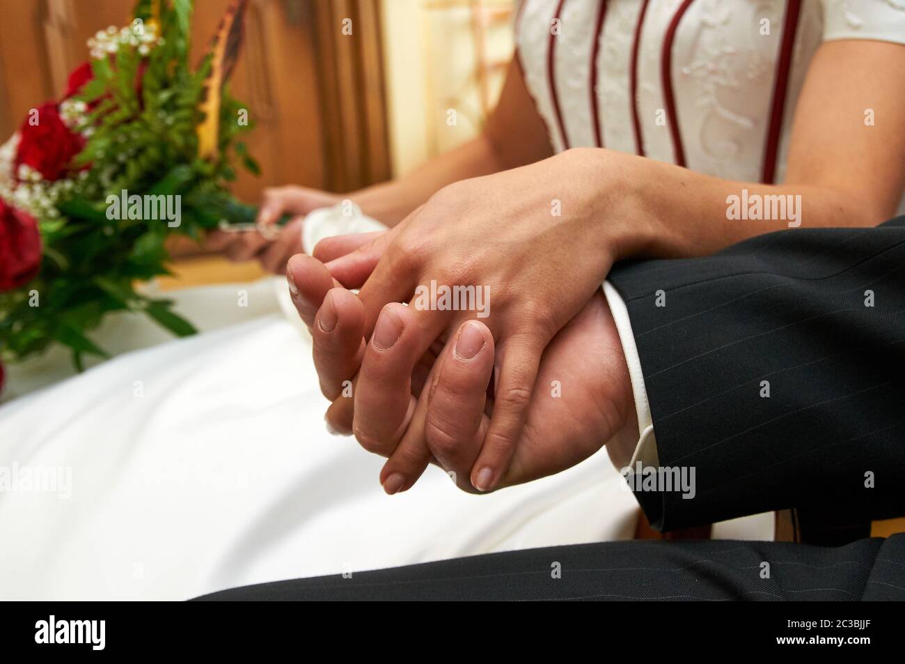 wedding couple hand in hand Stock Photo - Alamy