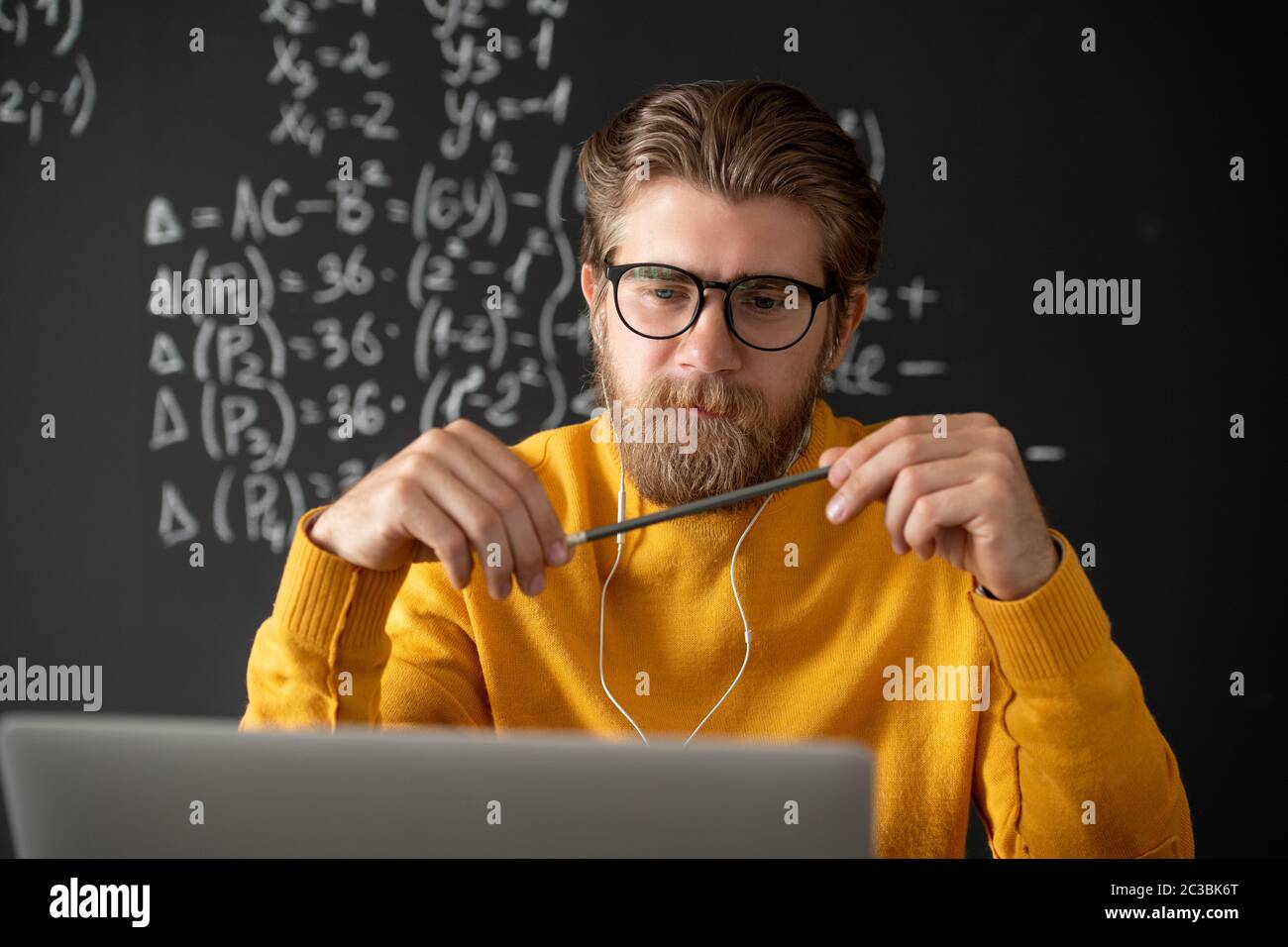 Serious teacher young with students hi-res stock photography and images ...