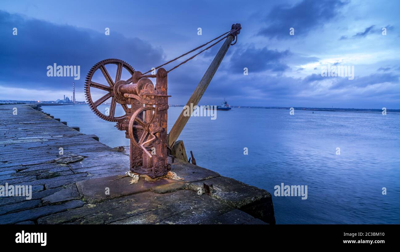 Old rusty manual dock crane on the long pier, The Great South Wall ...