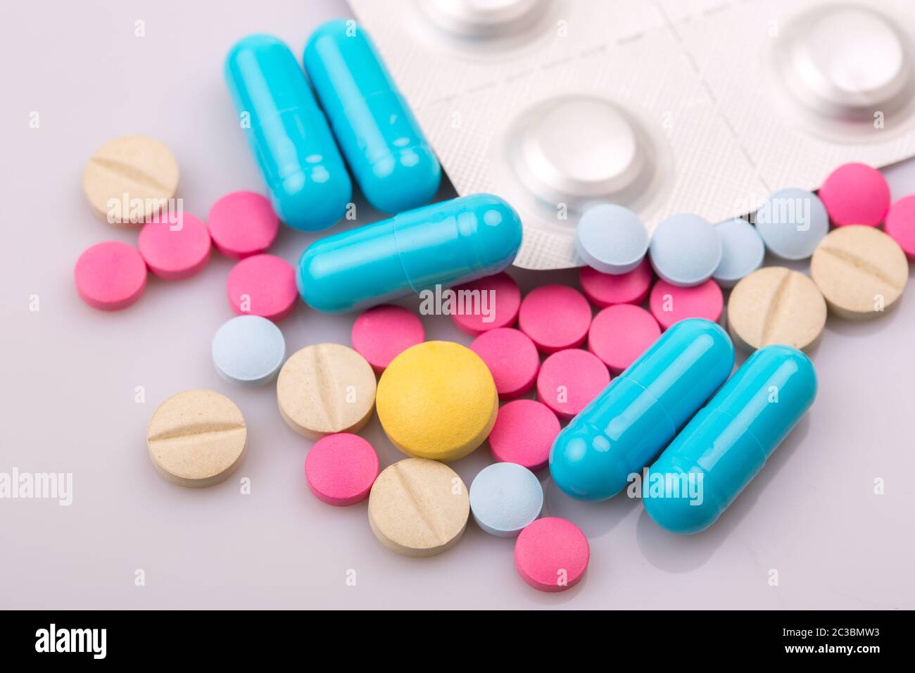 different Tablets pills capsule heap mix therapy drugs Stock Photo - Alamy
