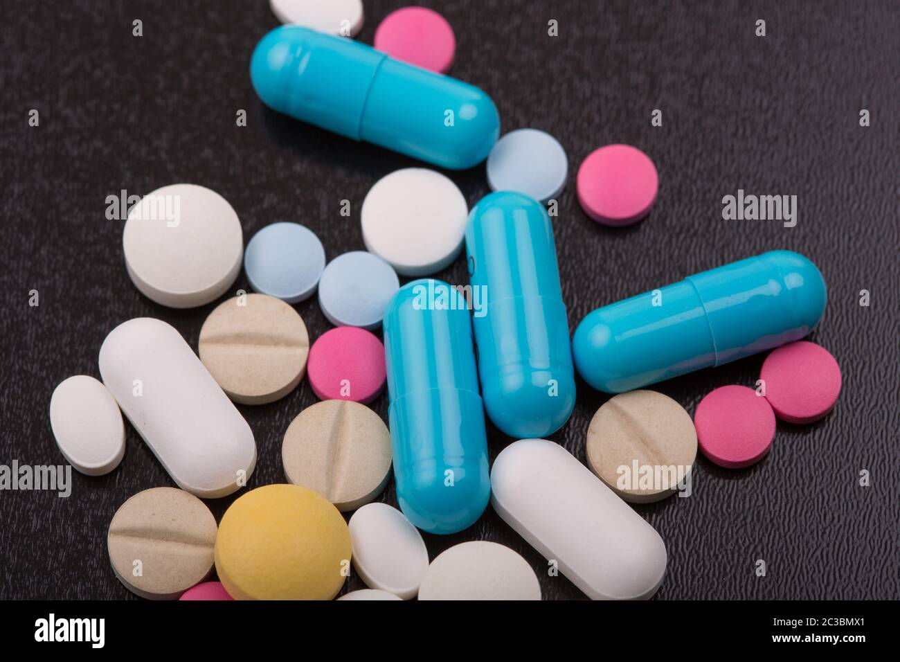 different tablets pills capsule heap mix therapy drugs Stock Photo - Alamy