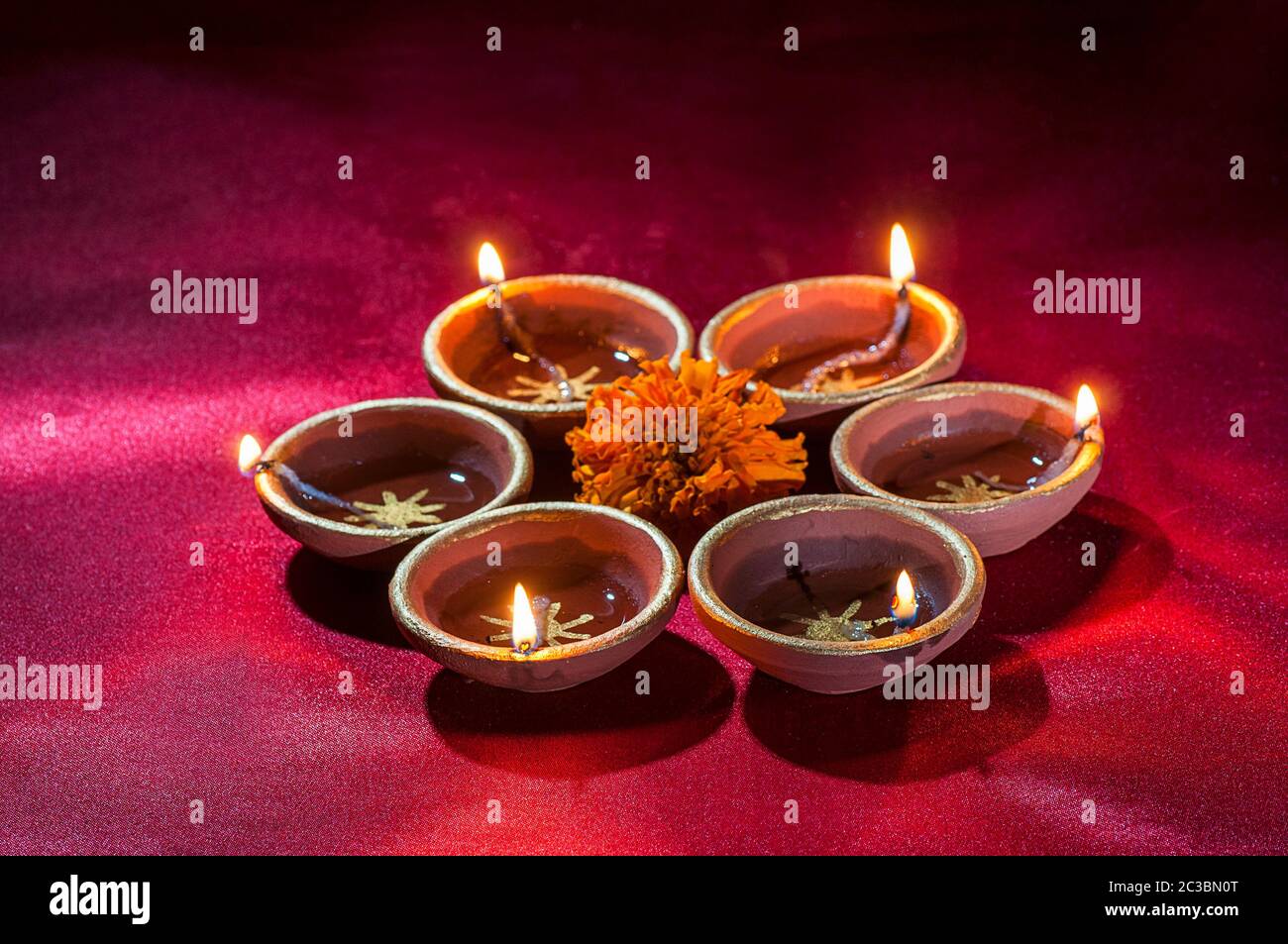 Clay diya lamps lit during Diwali Celebration. Greetings Card Design ...