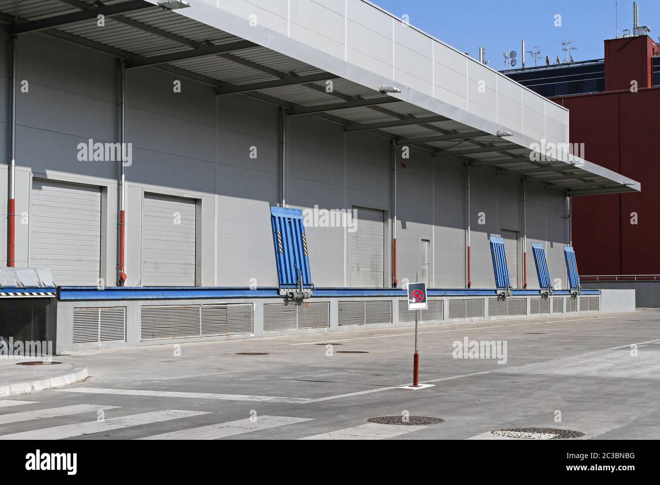 Exterior of industrial warehouse building with loading bay Stock Photo ...