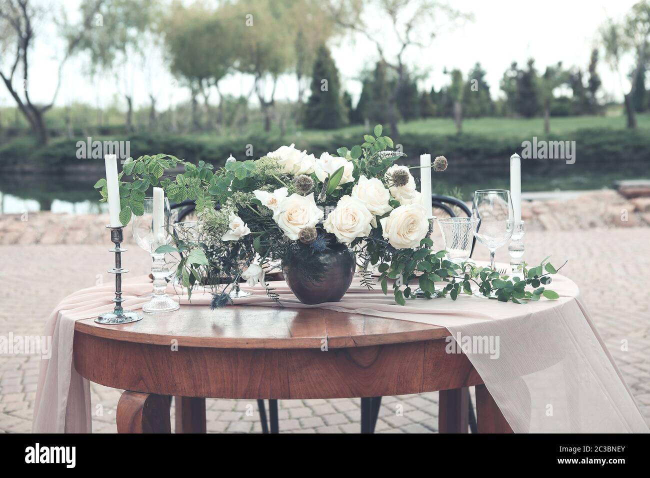 Table decorated for romantic dinner Stock Photo - Alamy