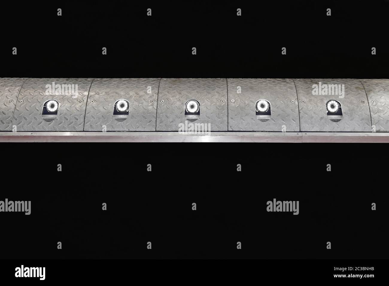 Transport cameras with LED lights in speed bump Stock Photo - Alamy