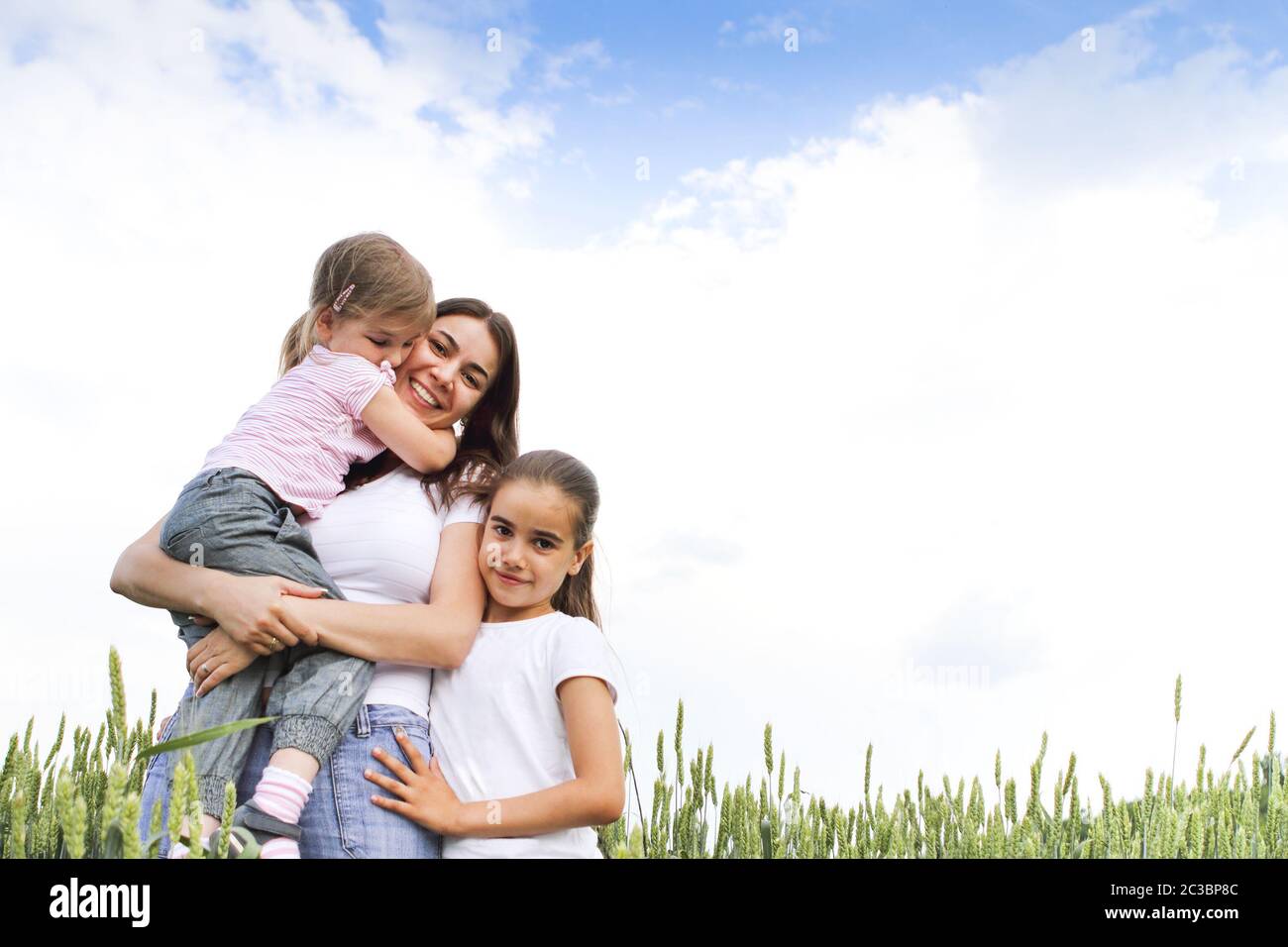 Young happy mother embracing hi-res stock photography and images - Alamy