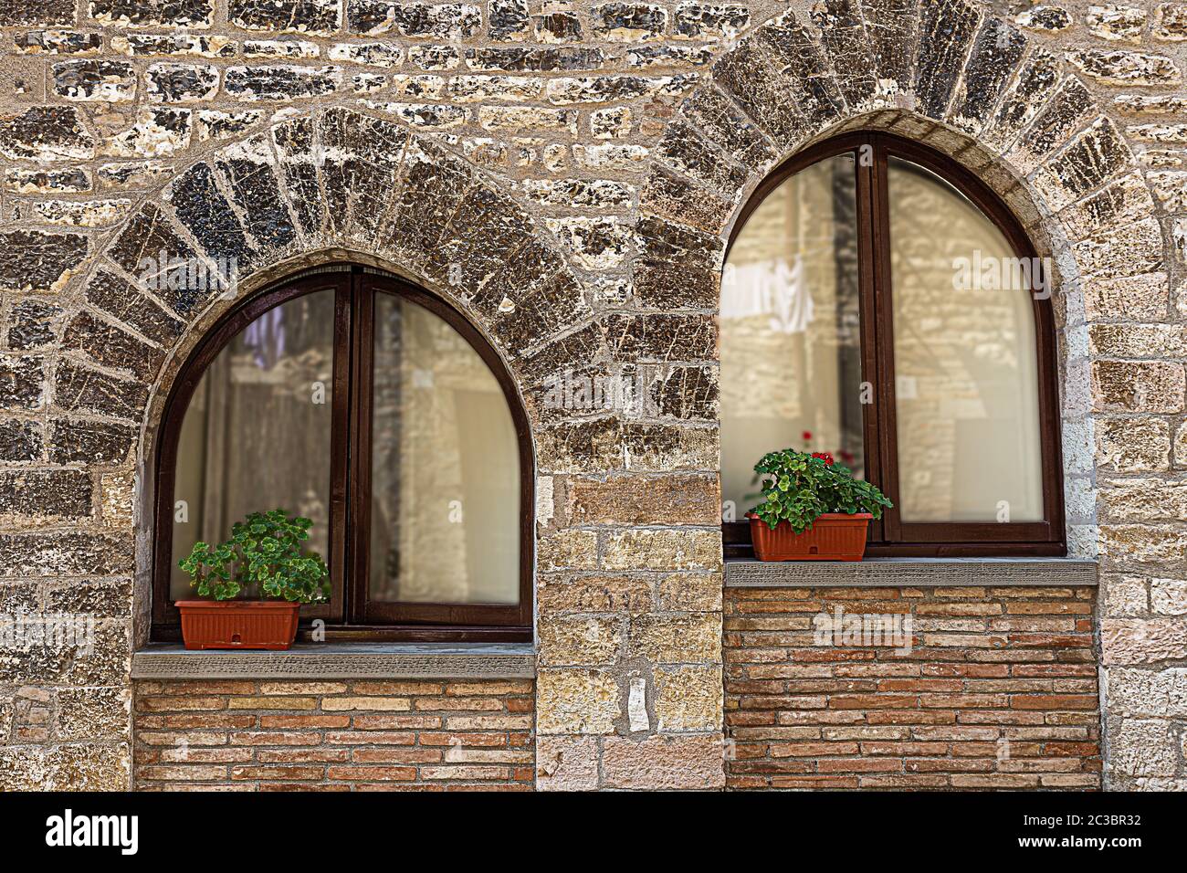 windows in the facades of ancient medieval houses Stock Photo - Alamy
