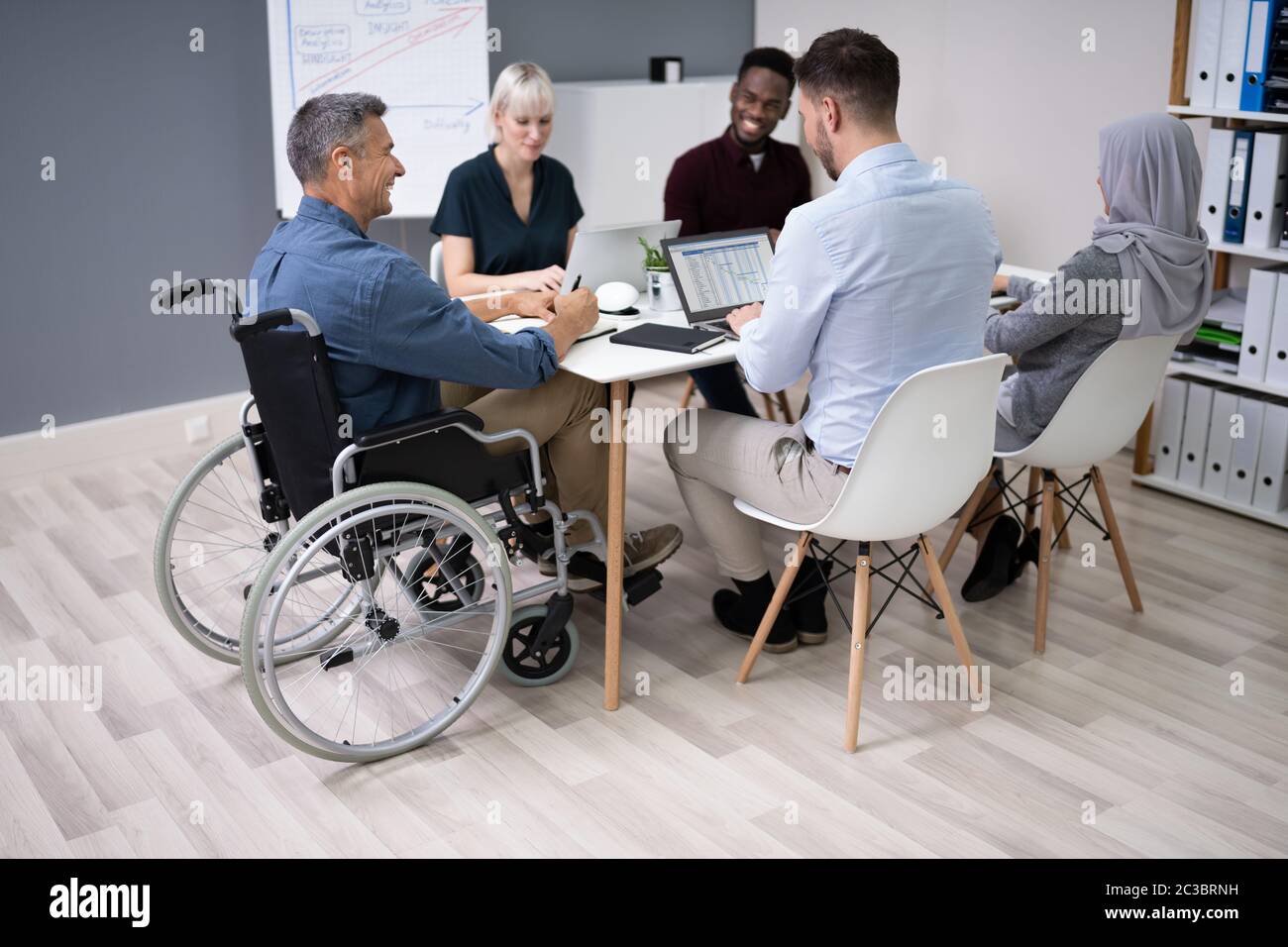 Diverse office disabled meeting hi-res stock photography and images - Alamy