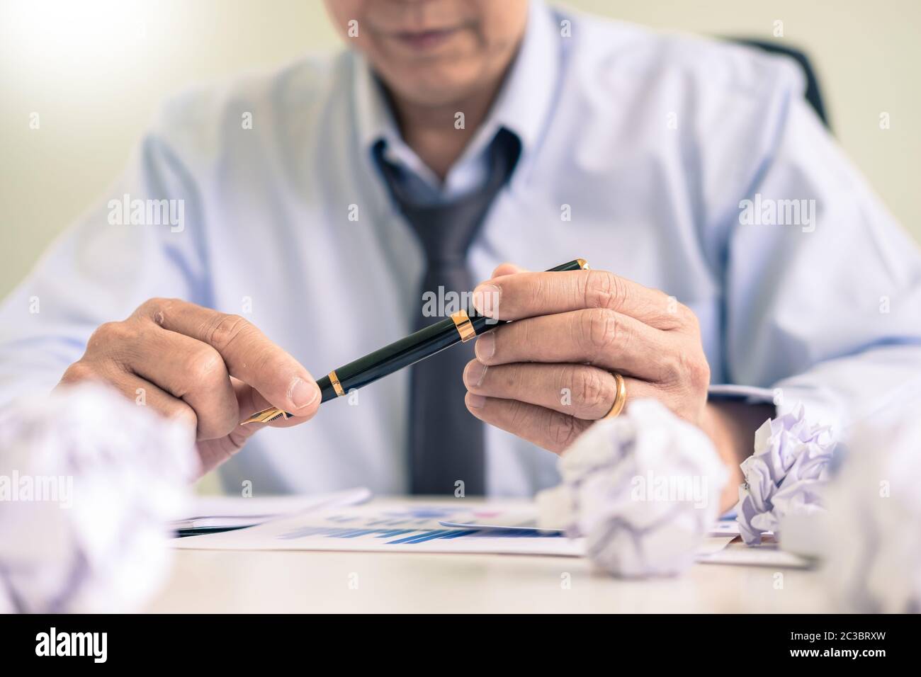 Depressed failure and tired businessman late sad and solving problem in ...