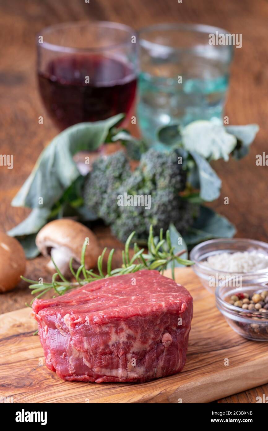 raw steak with broccoli on wood Stock Photo - Alamy