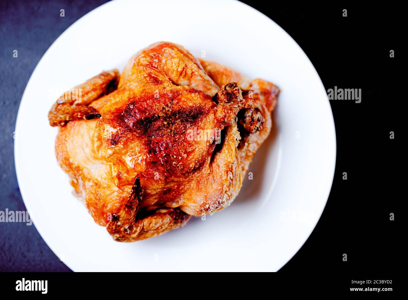 Whole oven roasted chicken Stock Photo - Alamy