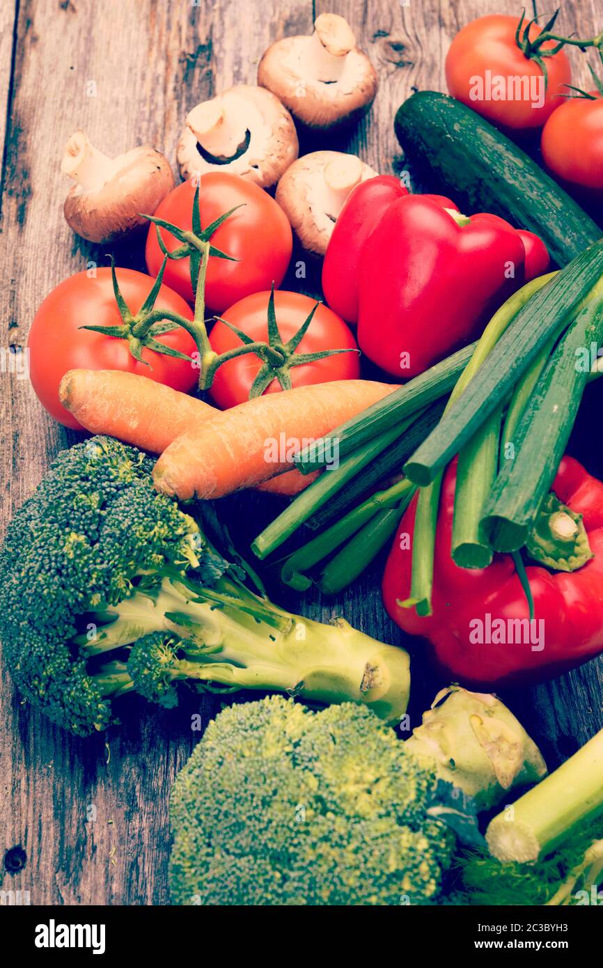 different vegetables on wooden ground Stock Photo - Alamy