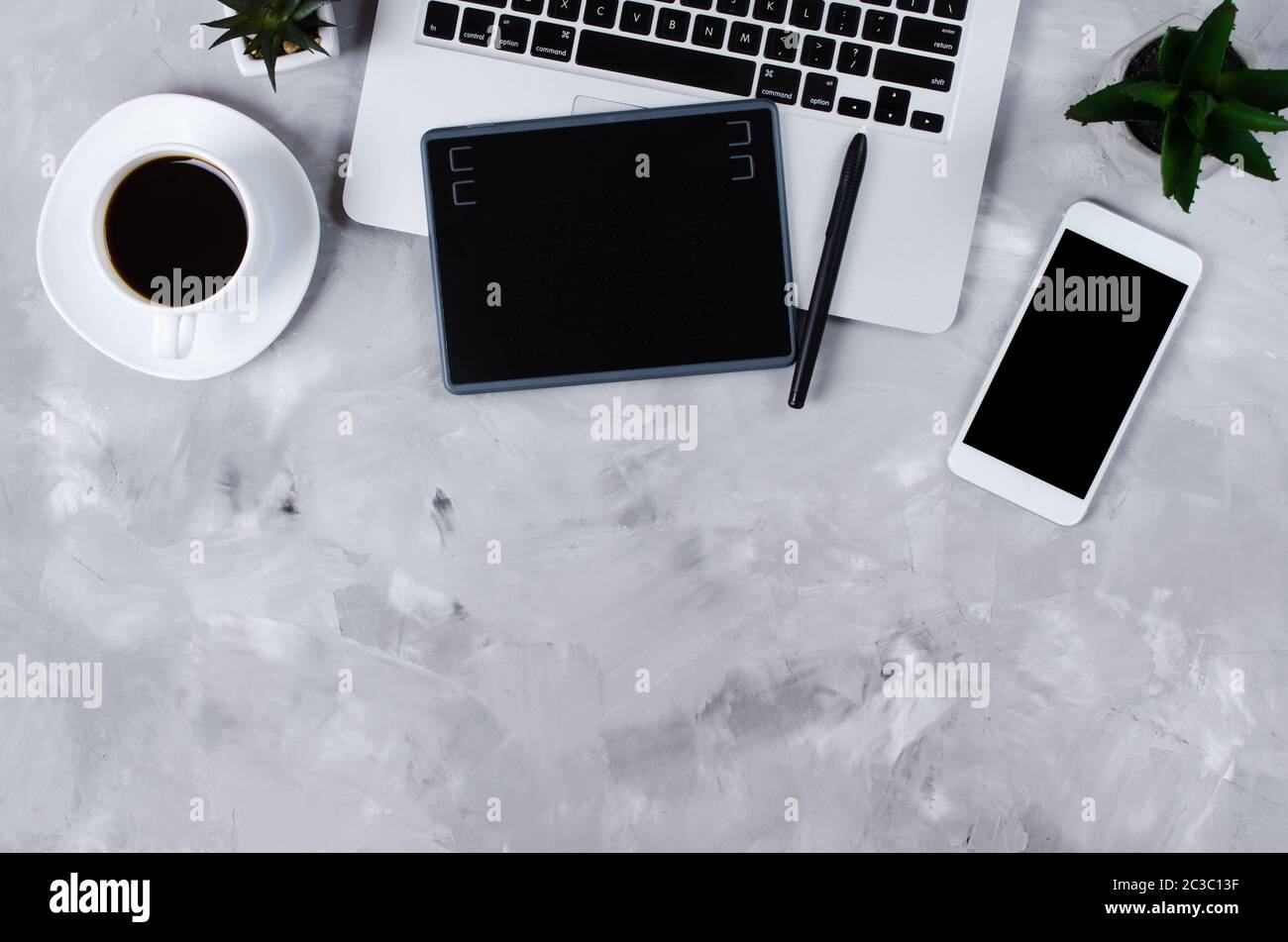 Flat lay photography of creative desk. Overhead view of graphic tablet ...